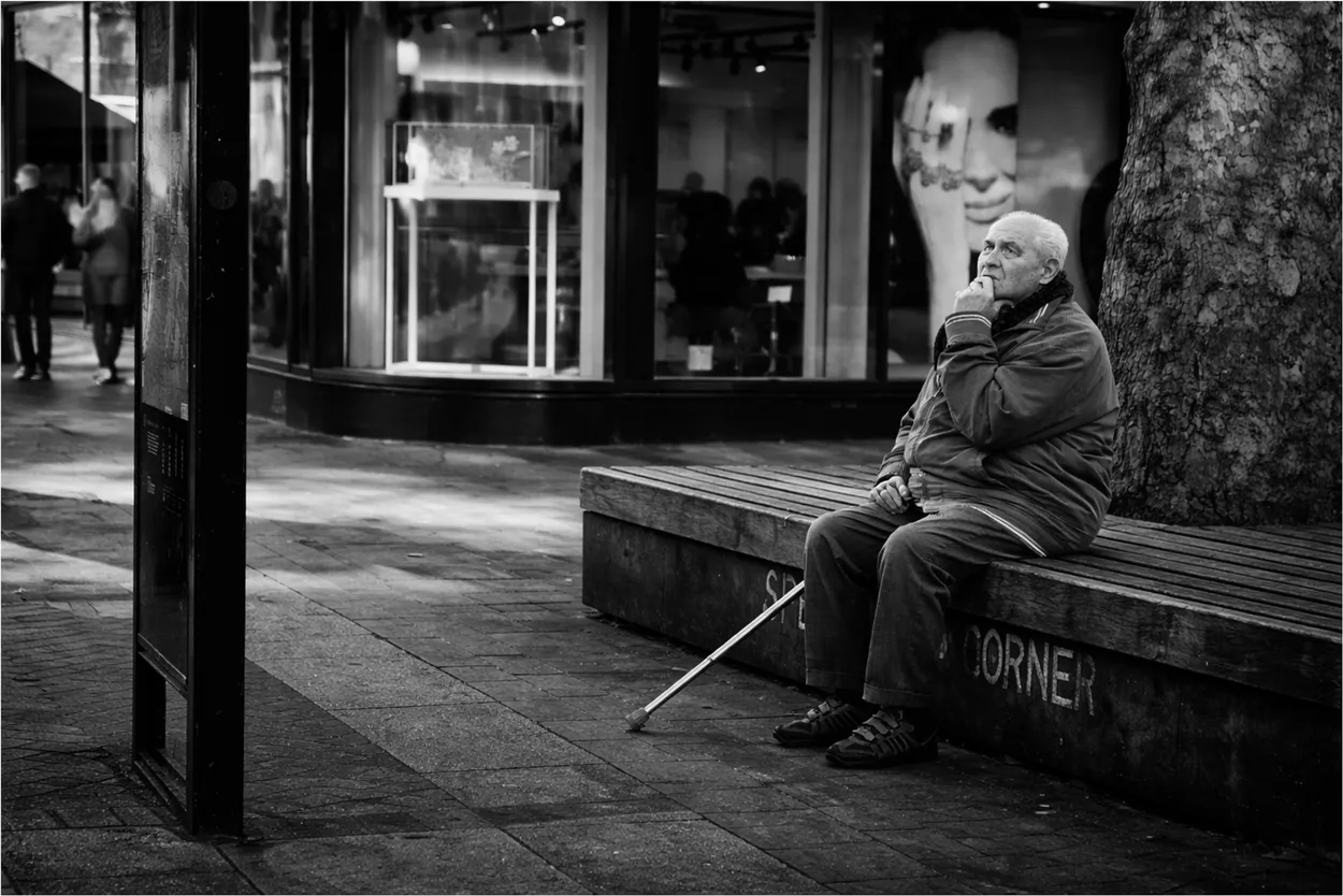 One Person Sitting Alone Outdoors - street photo contest | Photocrowd ...
